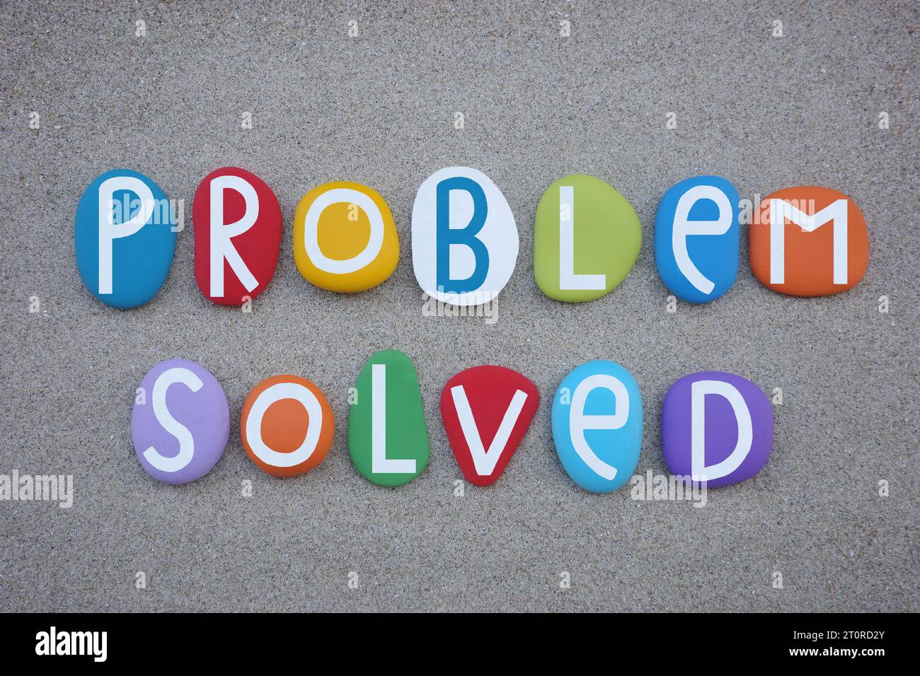 Problem solved, creative text composed with multi colored stone letters ... Problem solved, creative text composed with multi colored stone letters ...