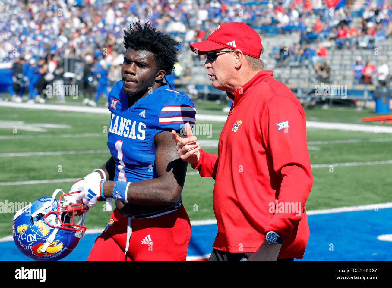 Kansas head coach Lance Leipold, right, talks with Kansas safety Kenny ...
