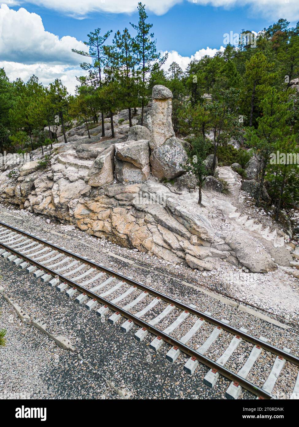 Captured from the vantage of a train journey, the rock formation known ...