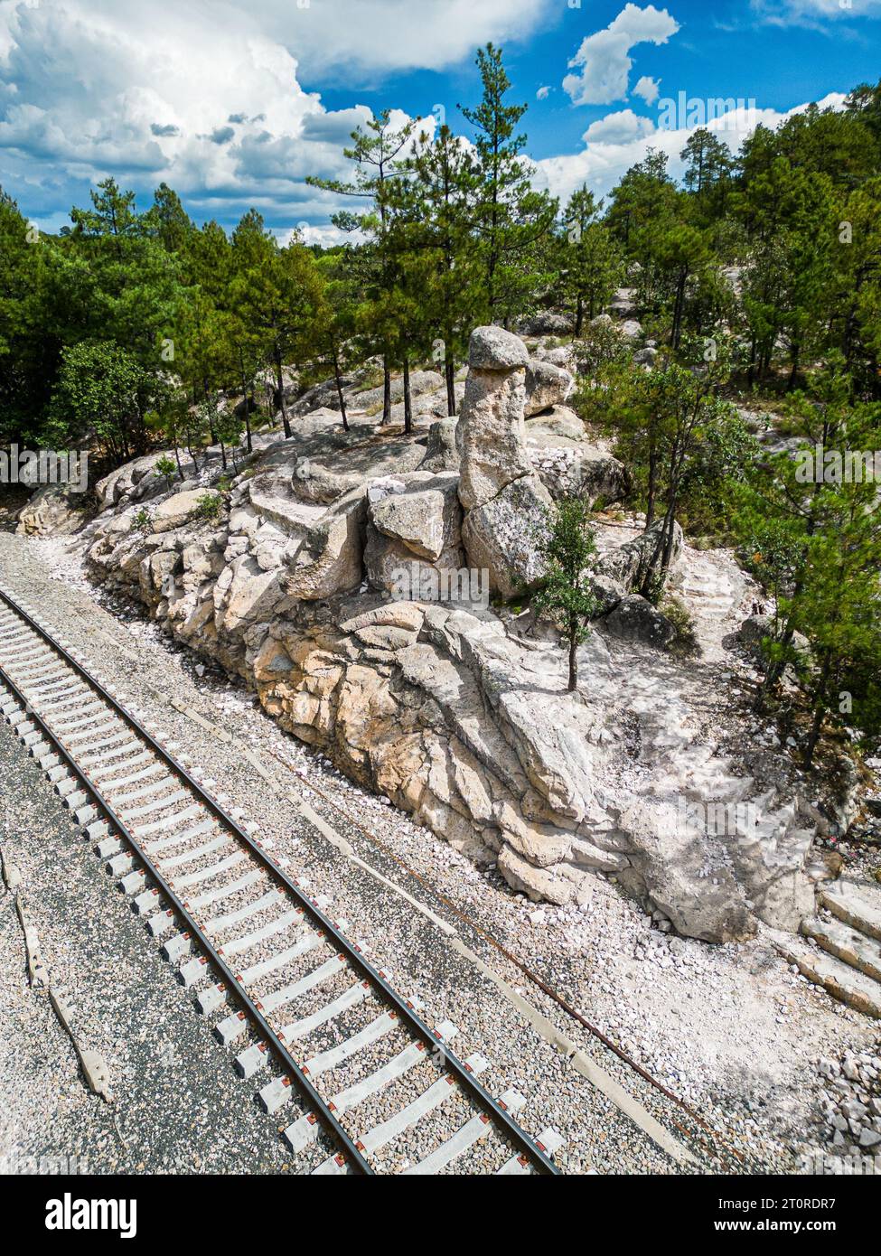 Captured from the vantage of a train journey, the rock formation known ...