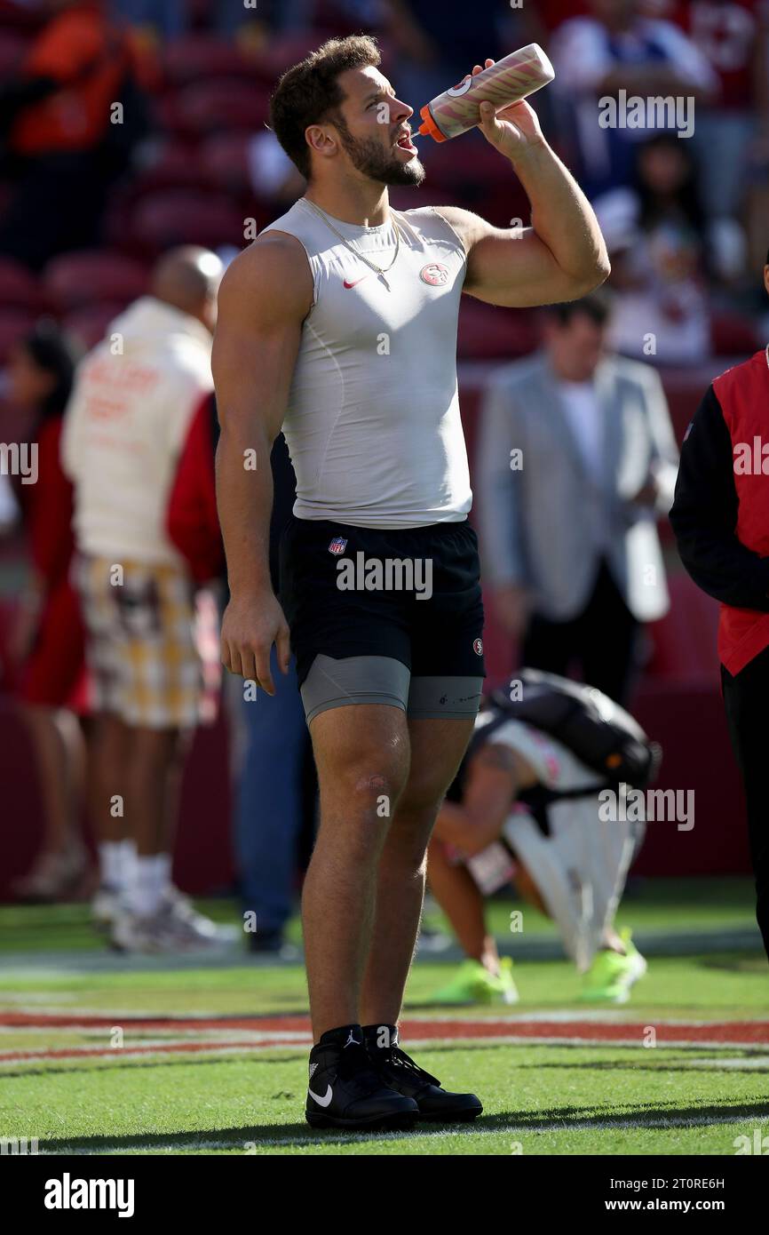 San Francisco 49ers defensive end Nick Bosa (97) drinks Gatorade before ...
