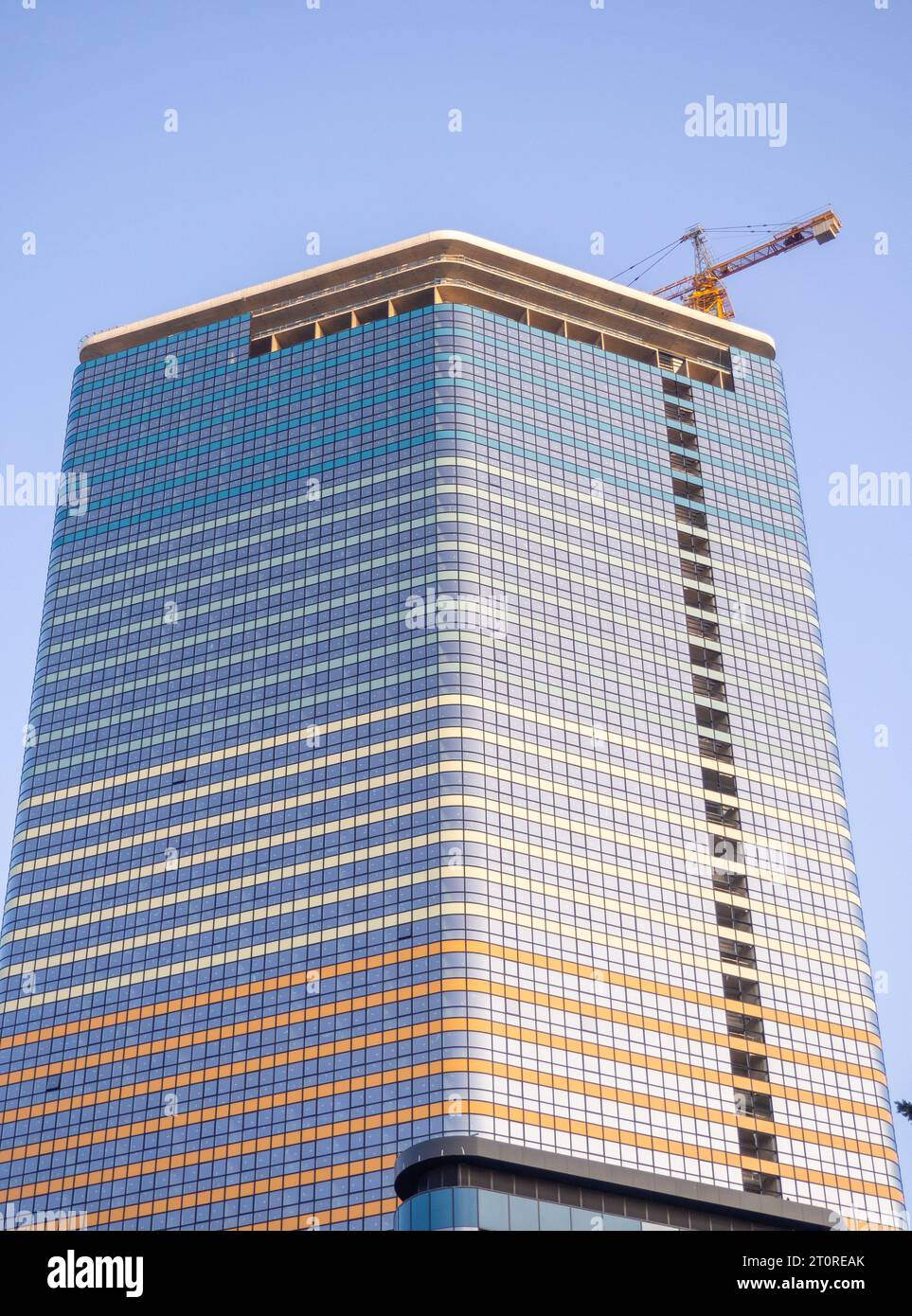 Construction of a high-rise building. Skyscraper glazing. Modern ...