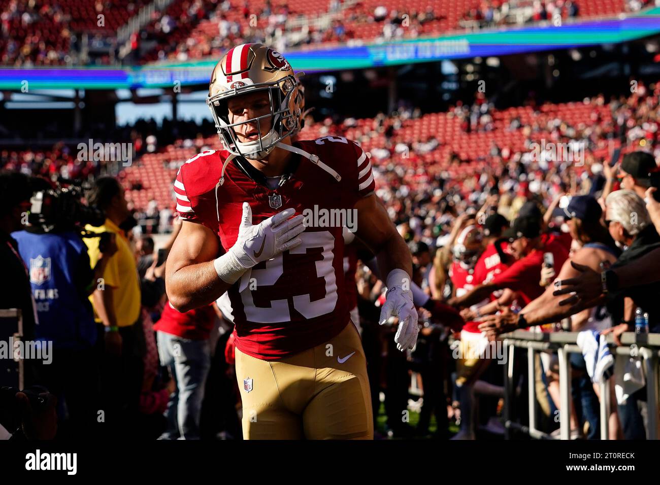 San Francisco 49ers running back Christian McCaffrey runs onto the ...