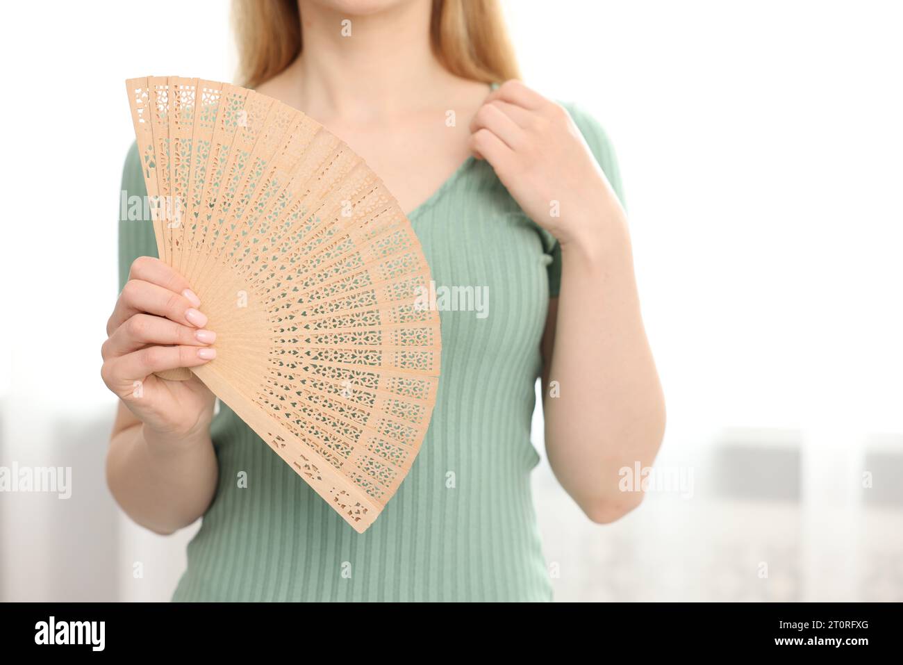 Hot woman fanning home hi-res stock photography and images - Alamy