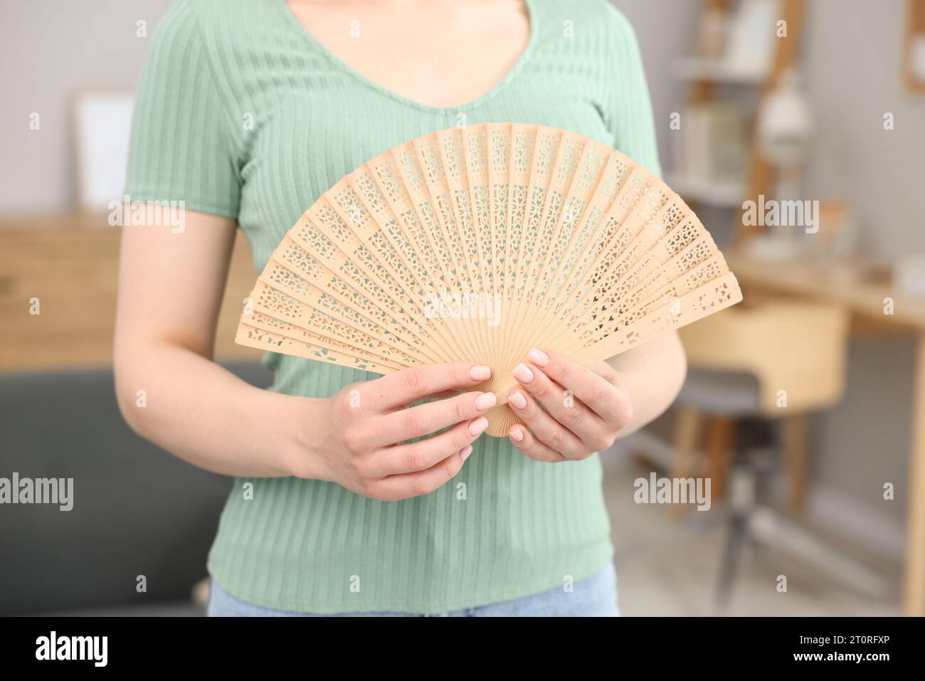 Hot woman fanning home hi-res stock photography and images - Alamy