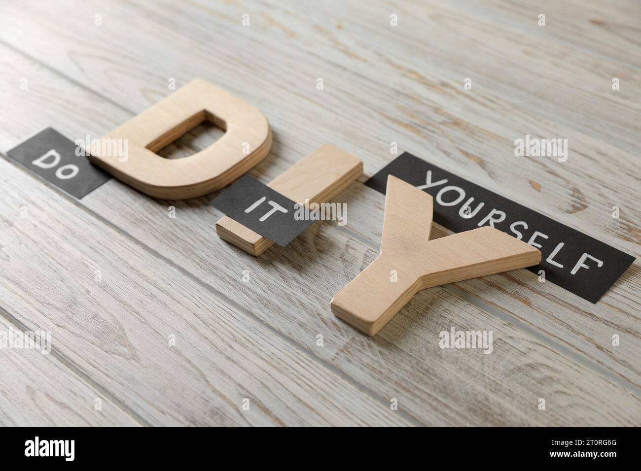 White diy word wooden letters hi-res stock photography and images - Alamy