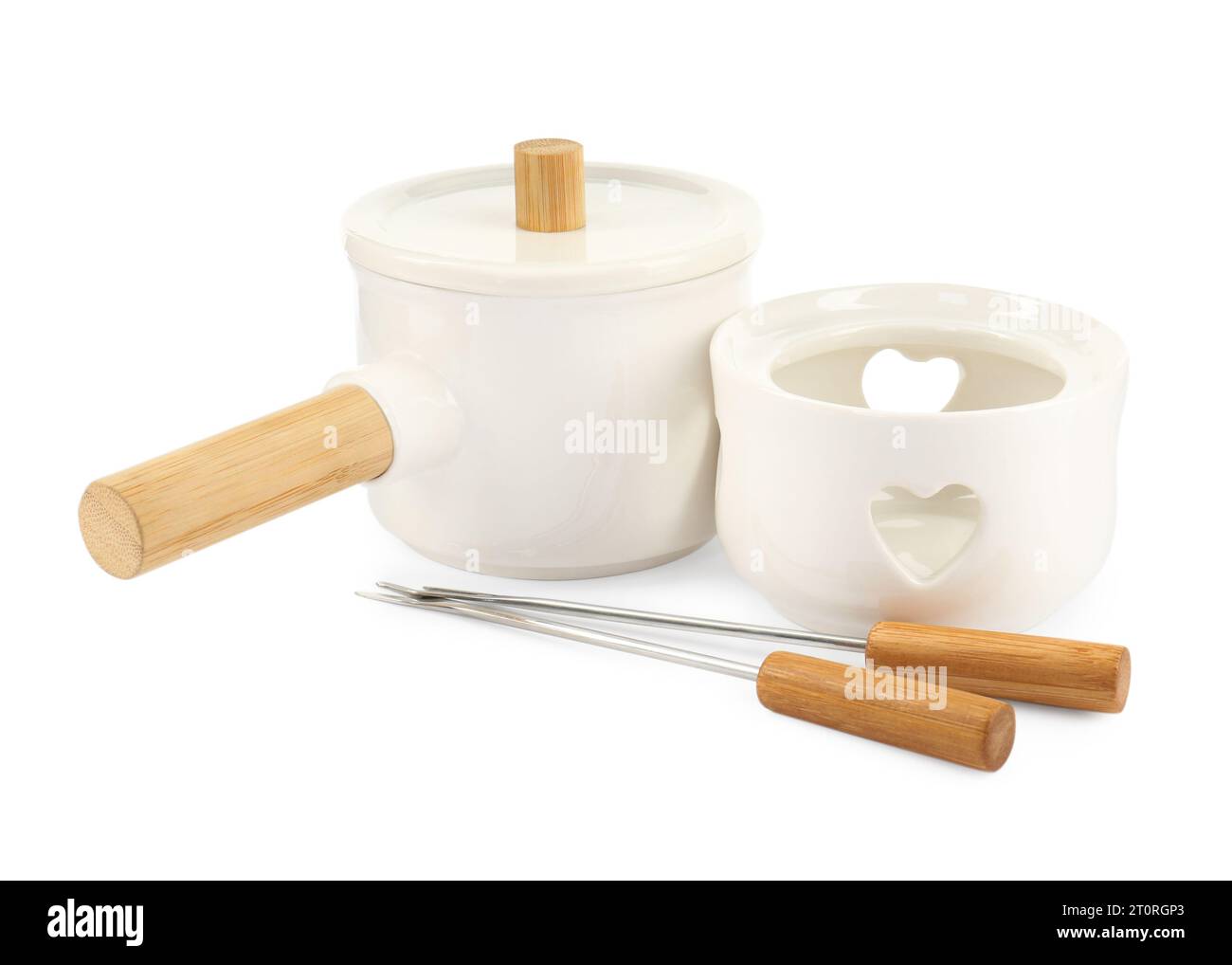 Fondue set isolated on white. Kitchen equipment Stock Photo - Alamy