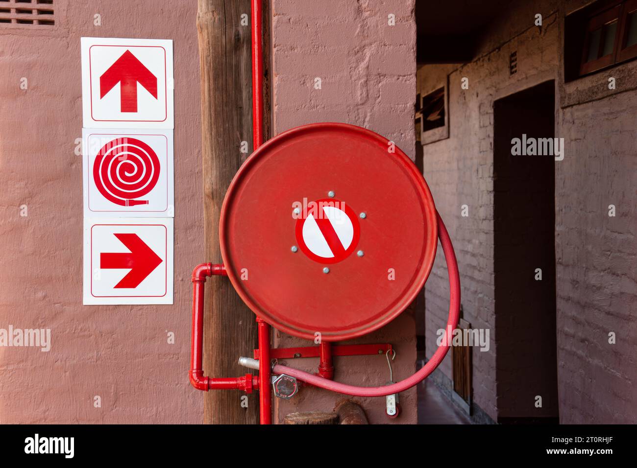 fire hydrant house on the hallway at a residential building, warning ...