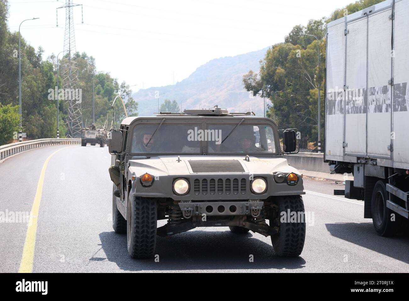 ISRAEL-LEBANON-PALESTINIAN-CONFLICT Israeli soldiers gesture from a ...