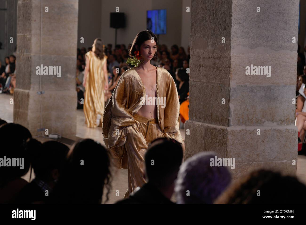 Lisbon, Portugal. 08th Oct, 2023. A model walks the runway during ...