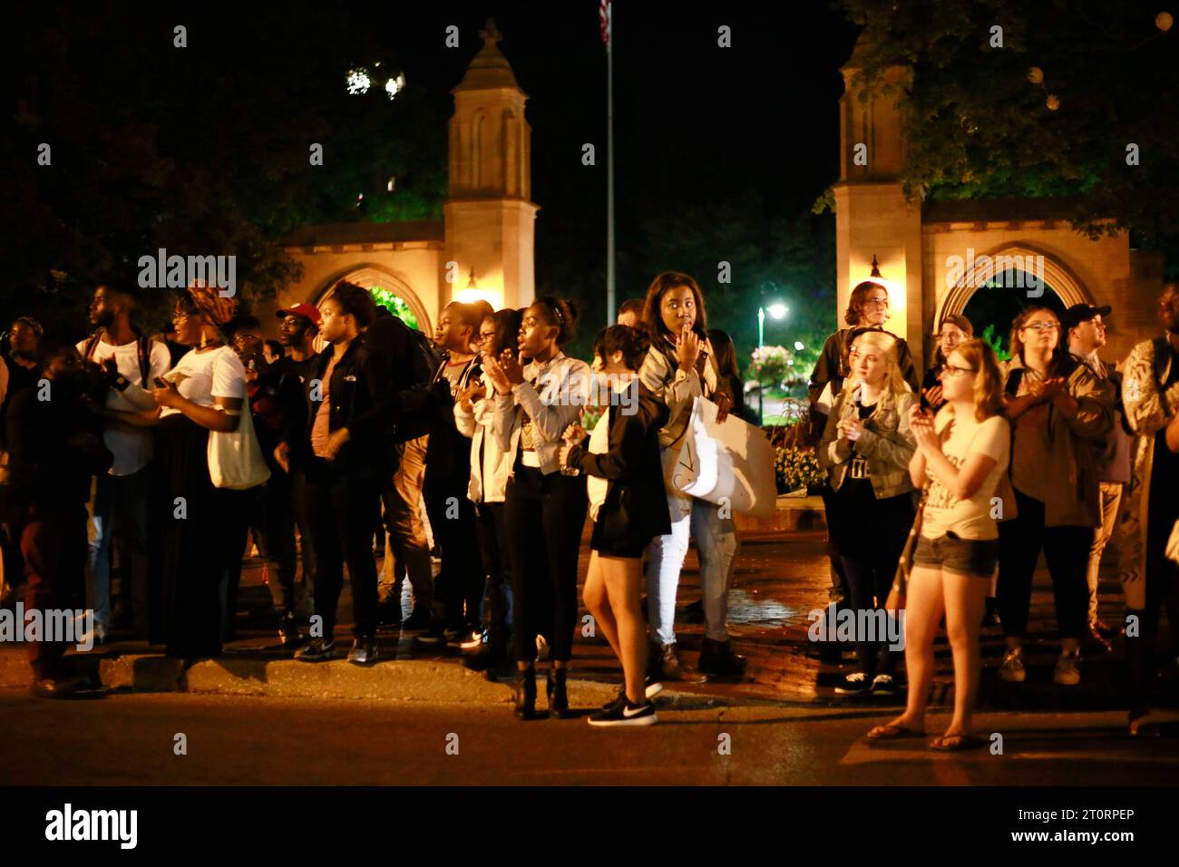 A crowd shuts down the intersection of Kirkwood and Indiana Avenue ...