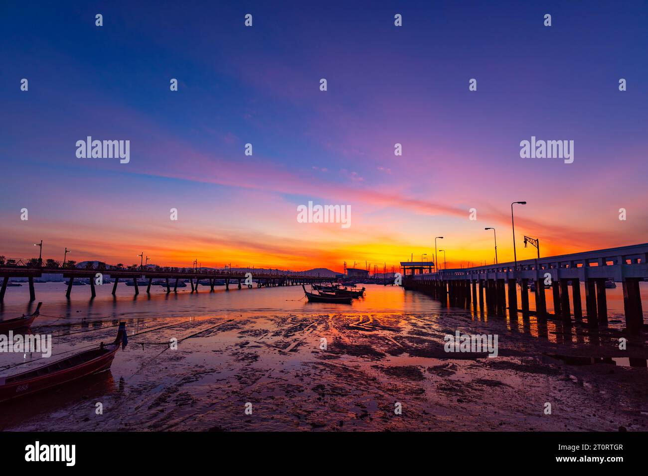 Chalong pier during sunrise or sunset,beautiful colorful dramatic sky ...