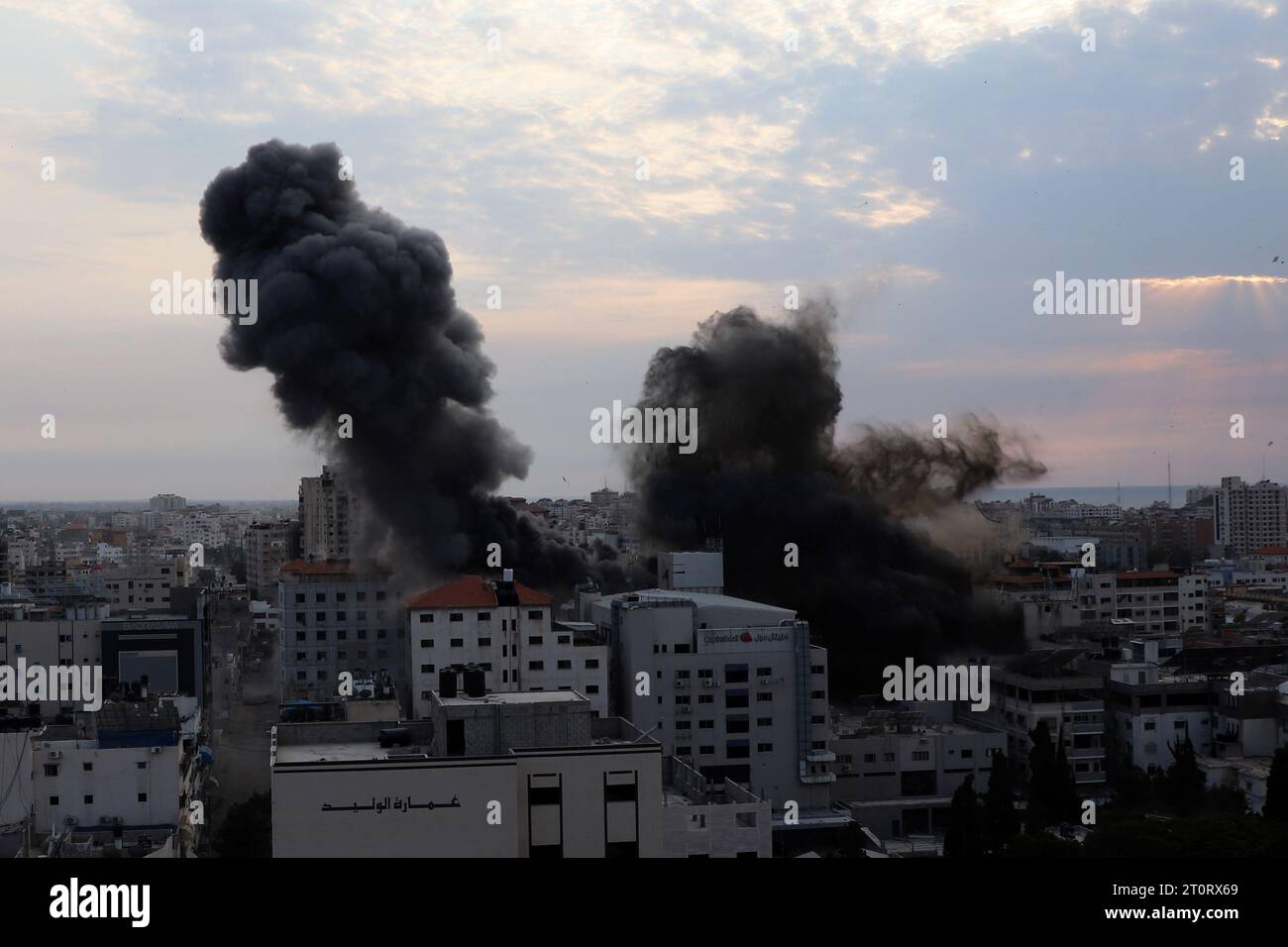 Gaza. 8th Oct, 2023. Smoke rises following an Israeli airstrike in Gaza ...