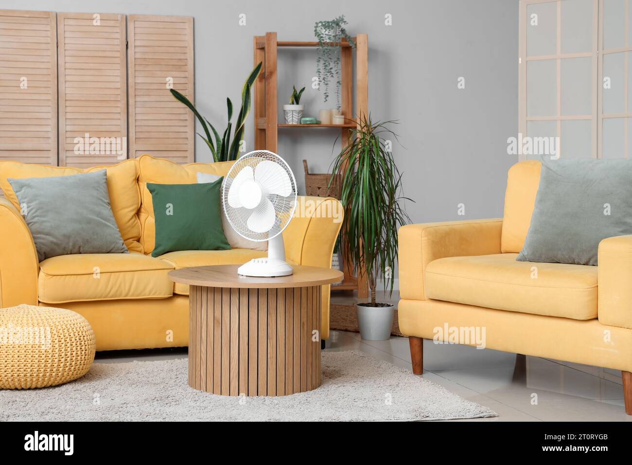 Yellow desk fan is spinning hi-res stock photography and images - Alamy