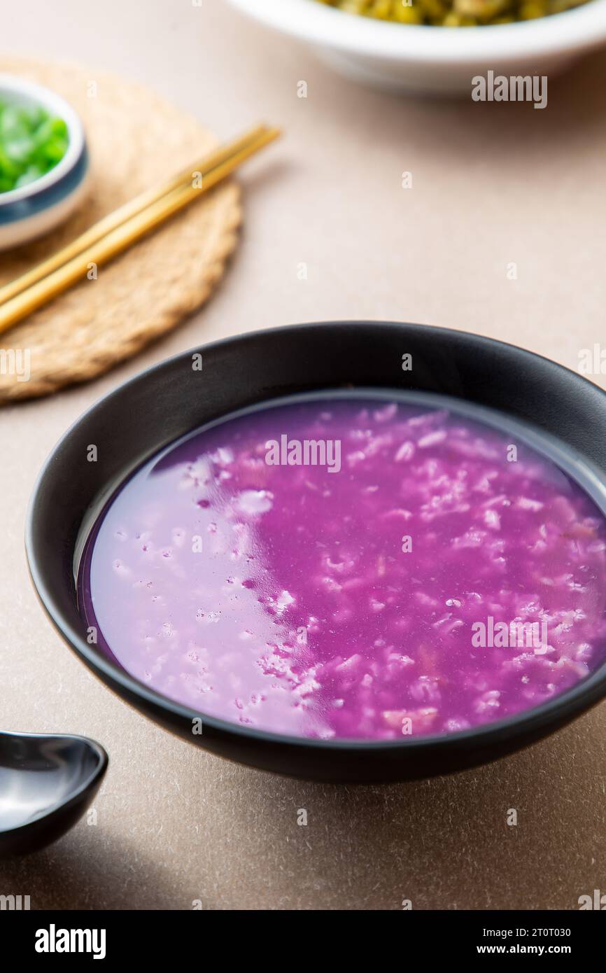 Black Glutinous Rice Congee, Chinese Purple rice porridge Stock Photo ...