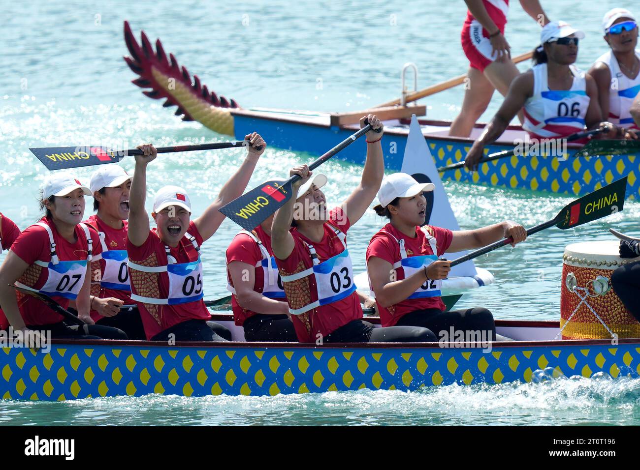 China's dragon boat team celebrates after finishing first in the Women ...