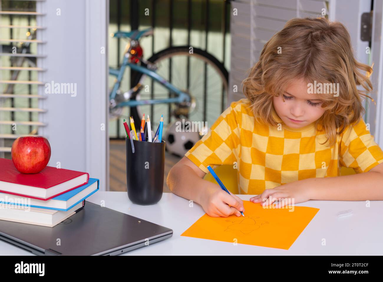 School child writing school homework. Kid boy from elementary school ...