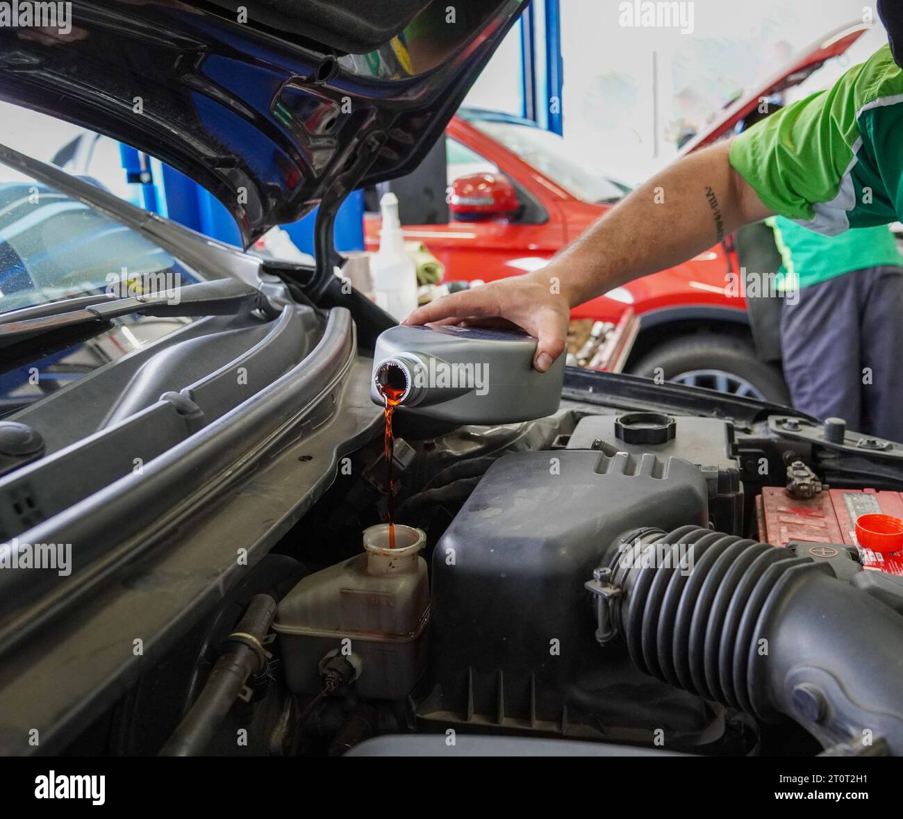 Close up view of a Maintenance Car service - auto oil change, motor ...