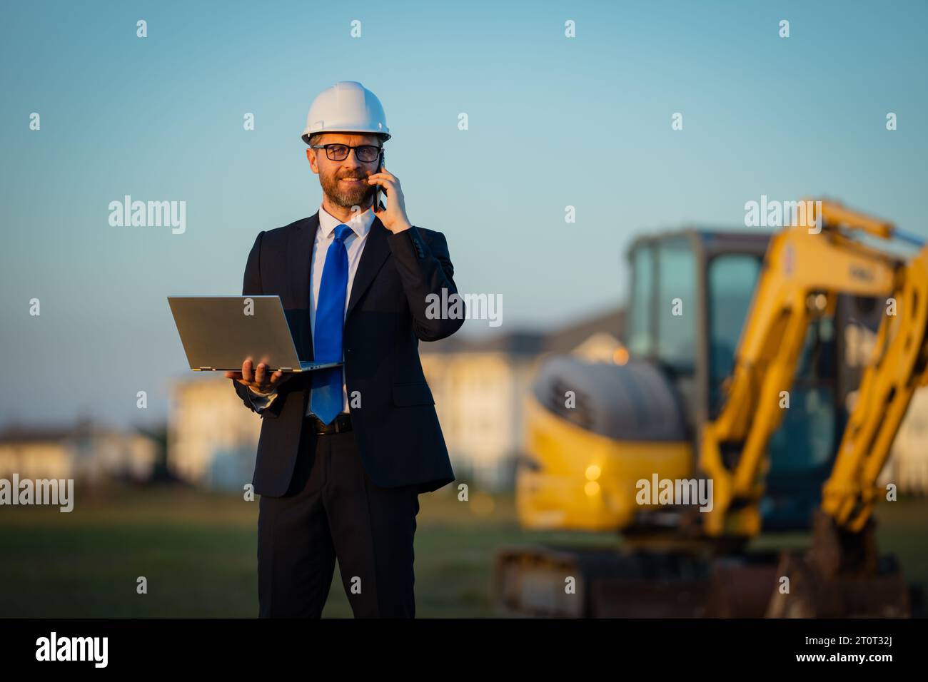 Civil engineer worker at a construction site. Mature engineer worker ...