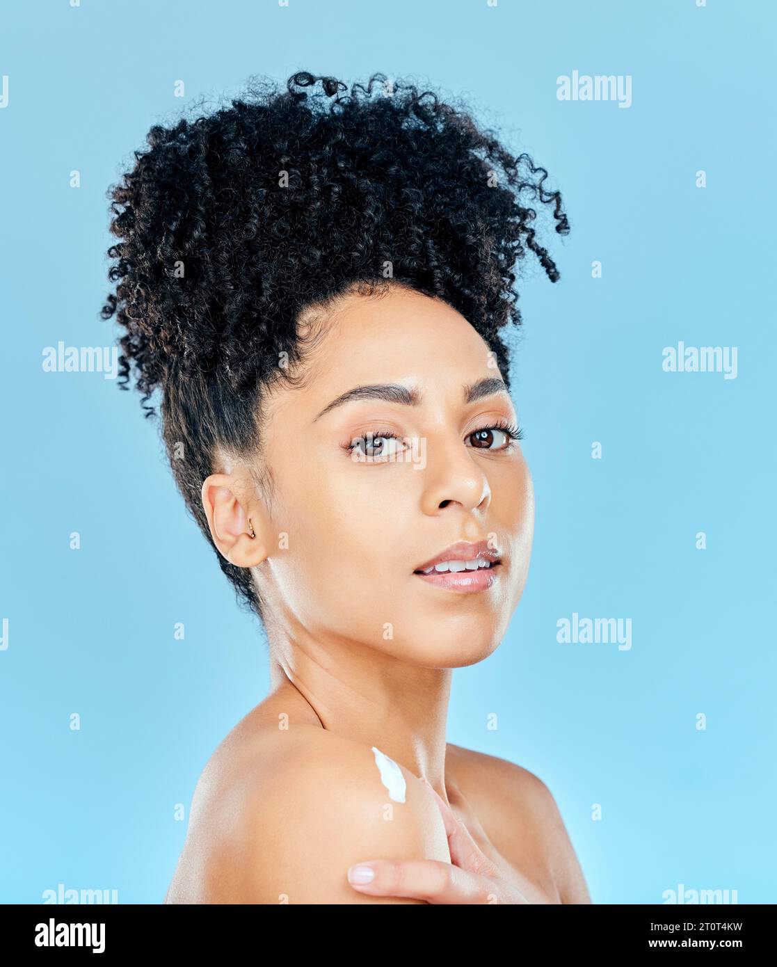 Beauty, studio portrait and woman with body cream application ...