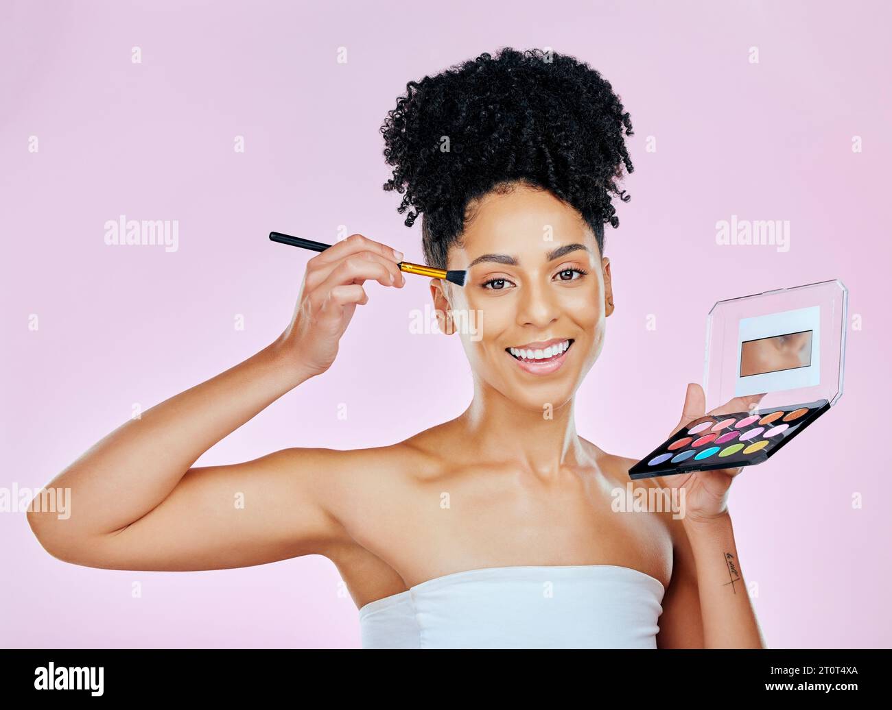 Makeup palette, portrait and woman smile for brush, beauty routine and ...