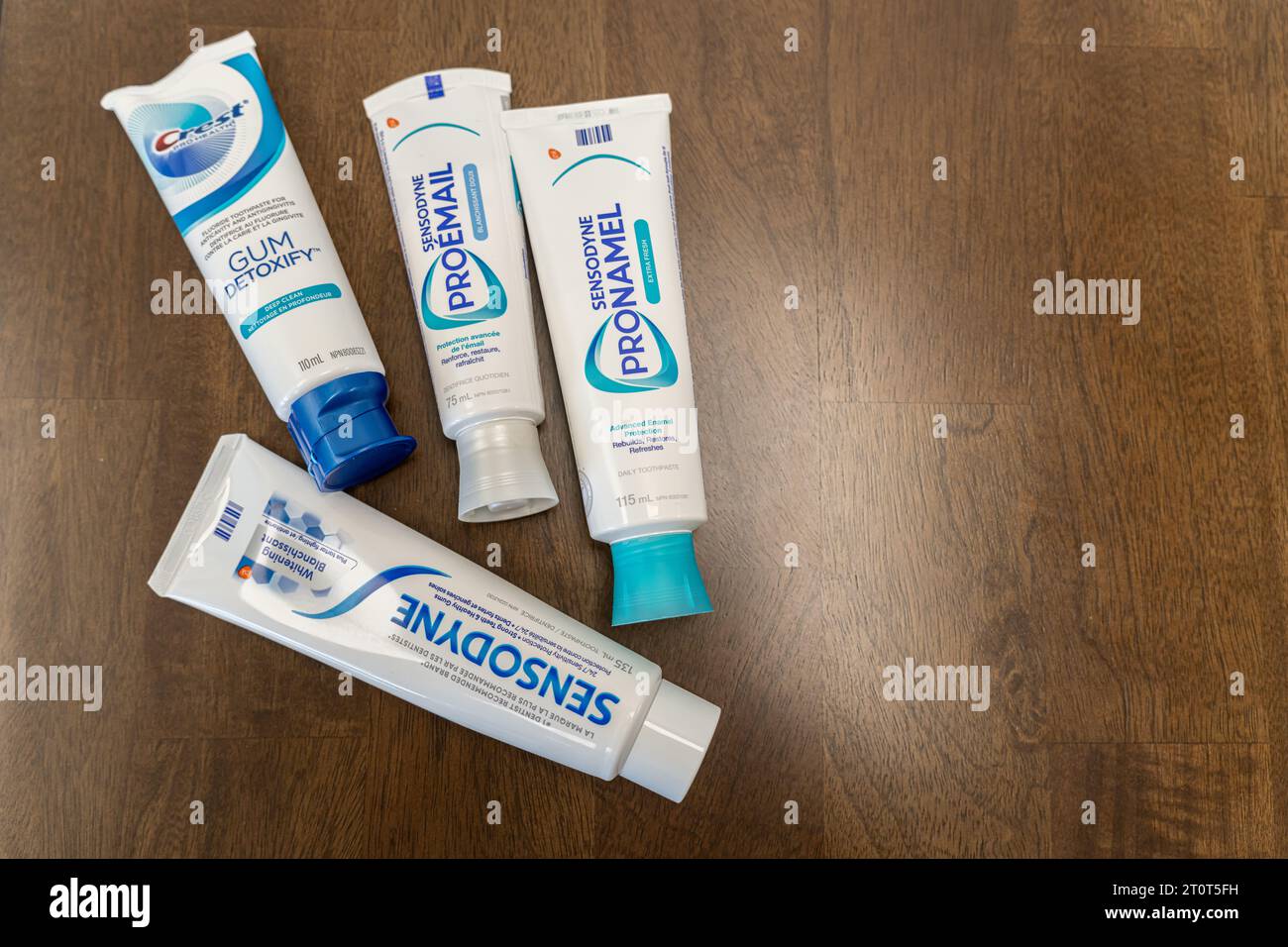 Set of Sensodyne toothpaste on display Stock Photo - Alamy