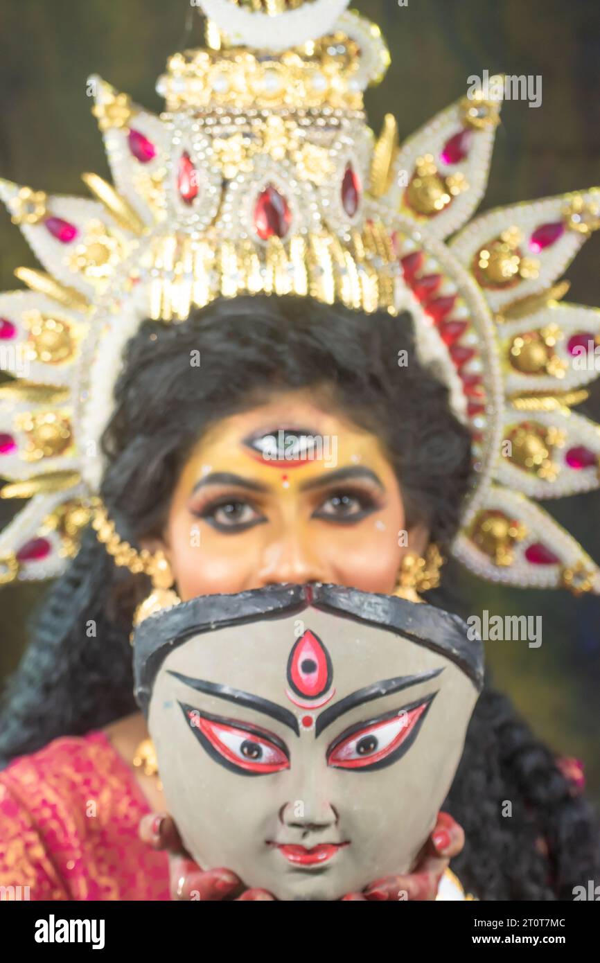 Agomoni concept photoshoot, A poses for the camera with an unfinished ...