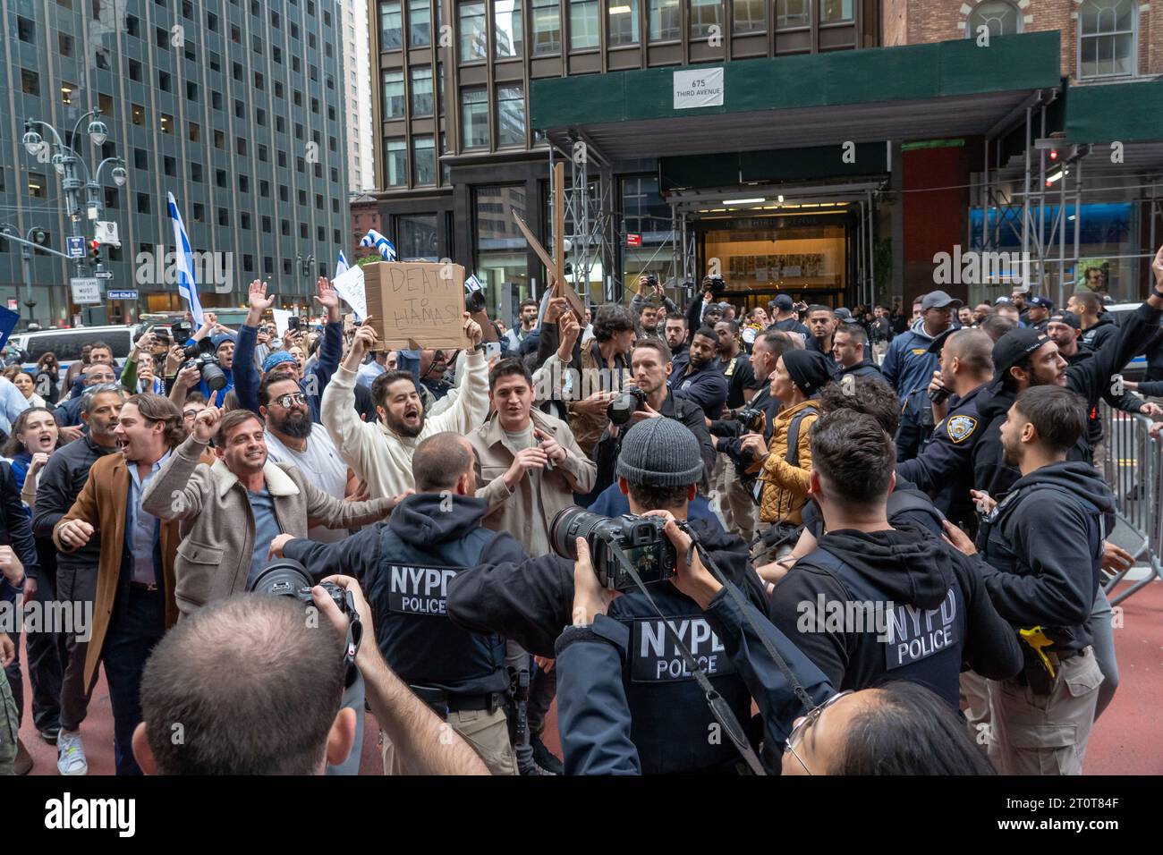 Pro-Israel protestors are pushed back by police near the Israeli ...