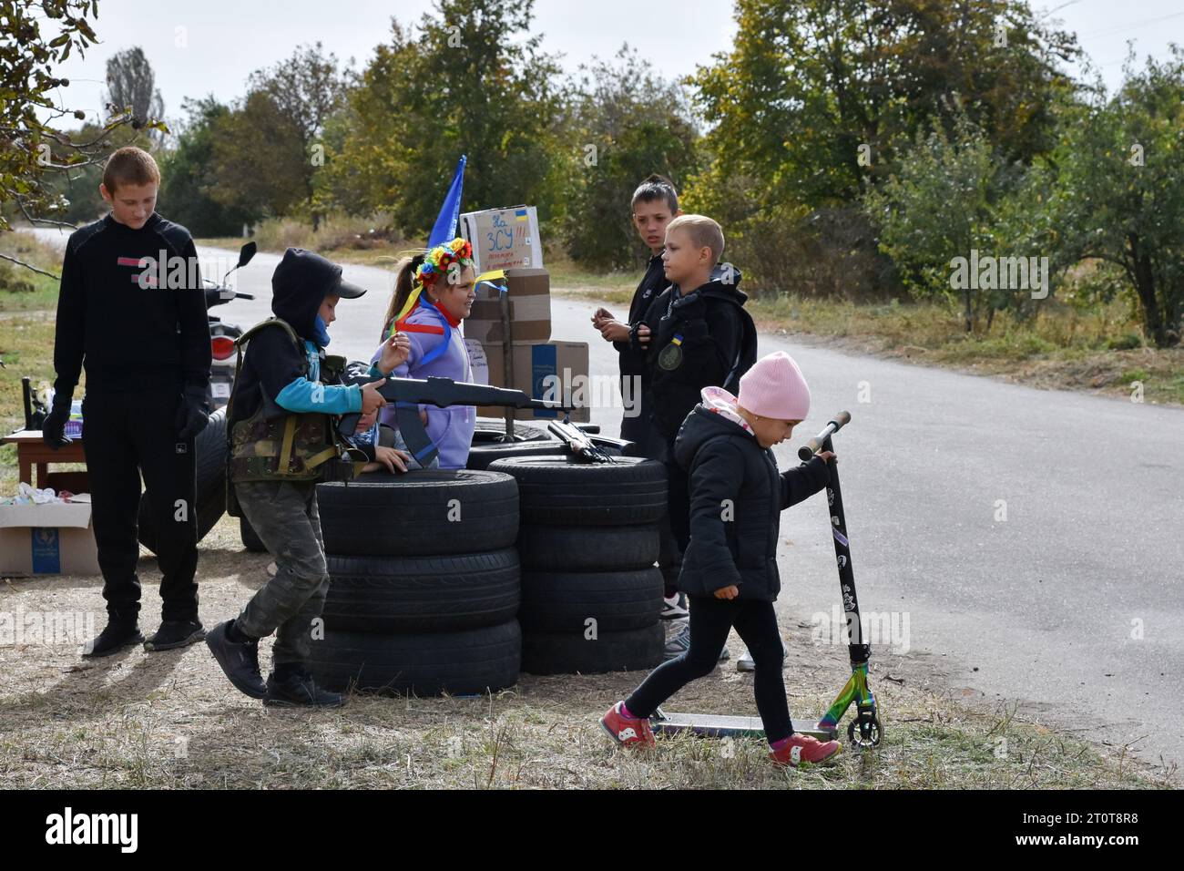 Bilenke, Ukraine. 07th Oct, 2023. Children pretending to be territorial ...