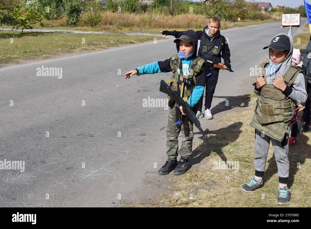 Bilenke, Ukraine. 07th Oct, 2023. Children pretending to be territorial ...