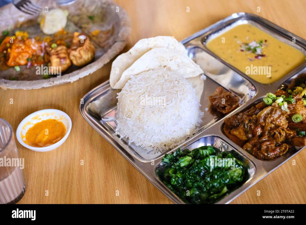 Chicken daal baht power (rice, spinach, lentil, pickle & chicken curry ...