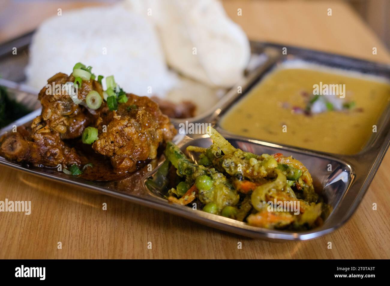 Chicken daal baht power (rice, spinach, lentil, pickle & chicken curry ...