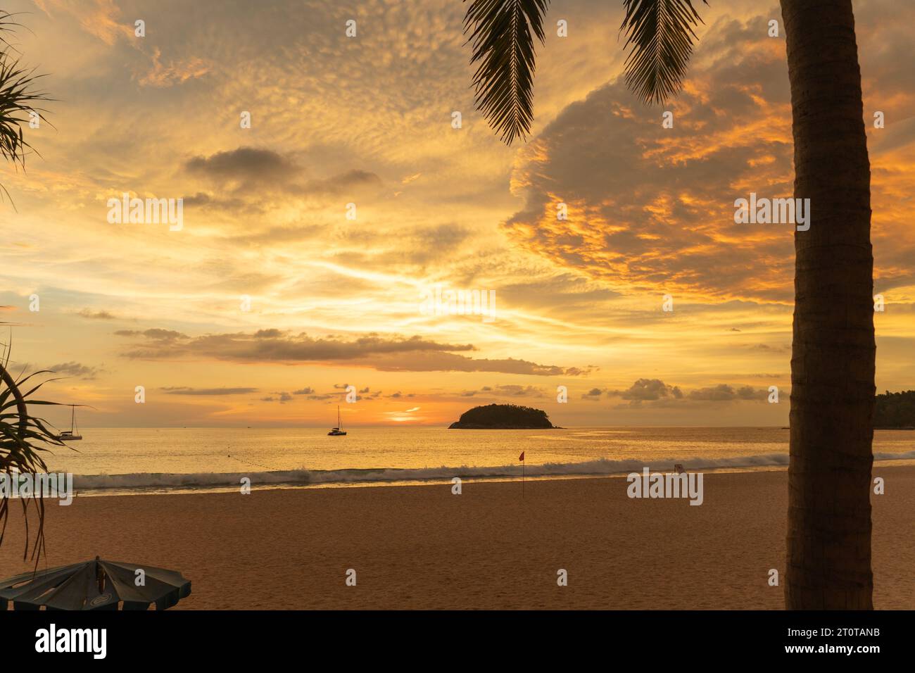 beautiful golden sunset above the ocean. yellow cloud moving in nature ...