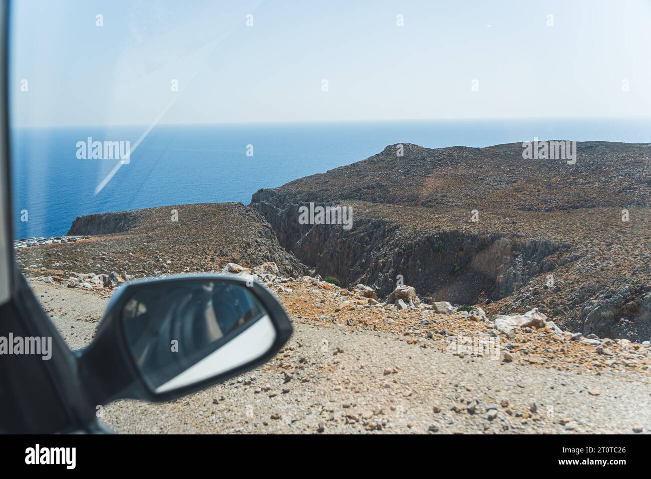 driving in Seitan Limania and enjoying the rocky view, Crete. High ...