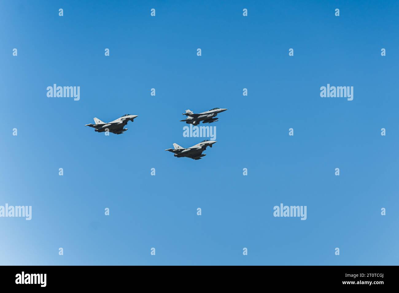 Three cobra fighter planes agains bright blue sky during a military ...