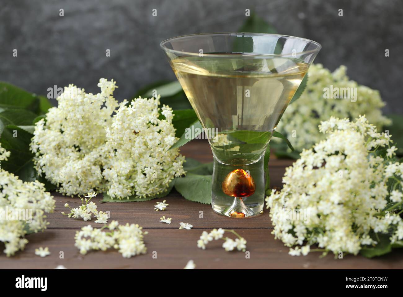 original glass with elderflower liqueur with decoration of elder ...