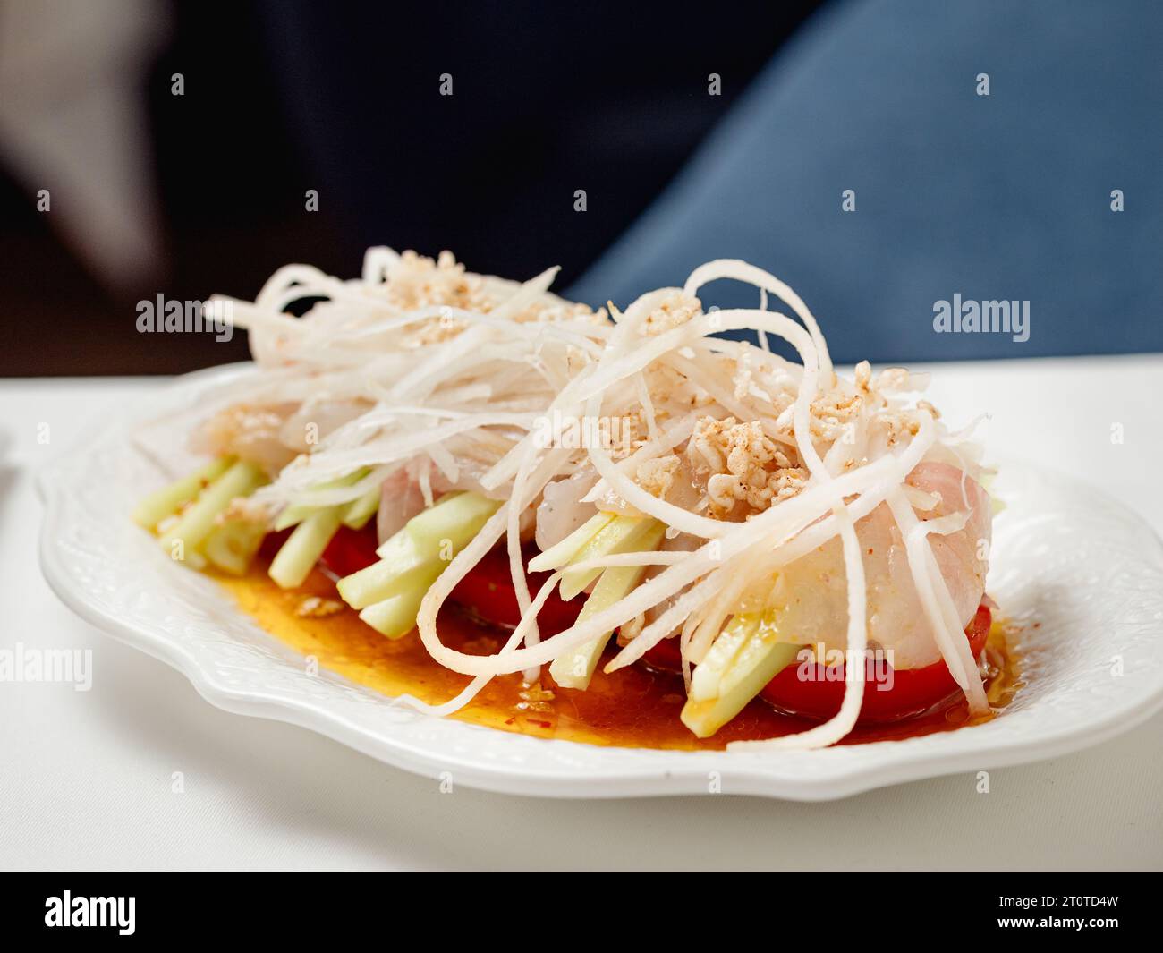 Sophisticated Fish ceviche in modern restaurant interior. Ceviche or ...