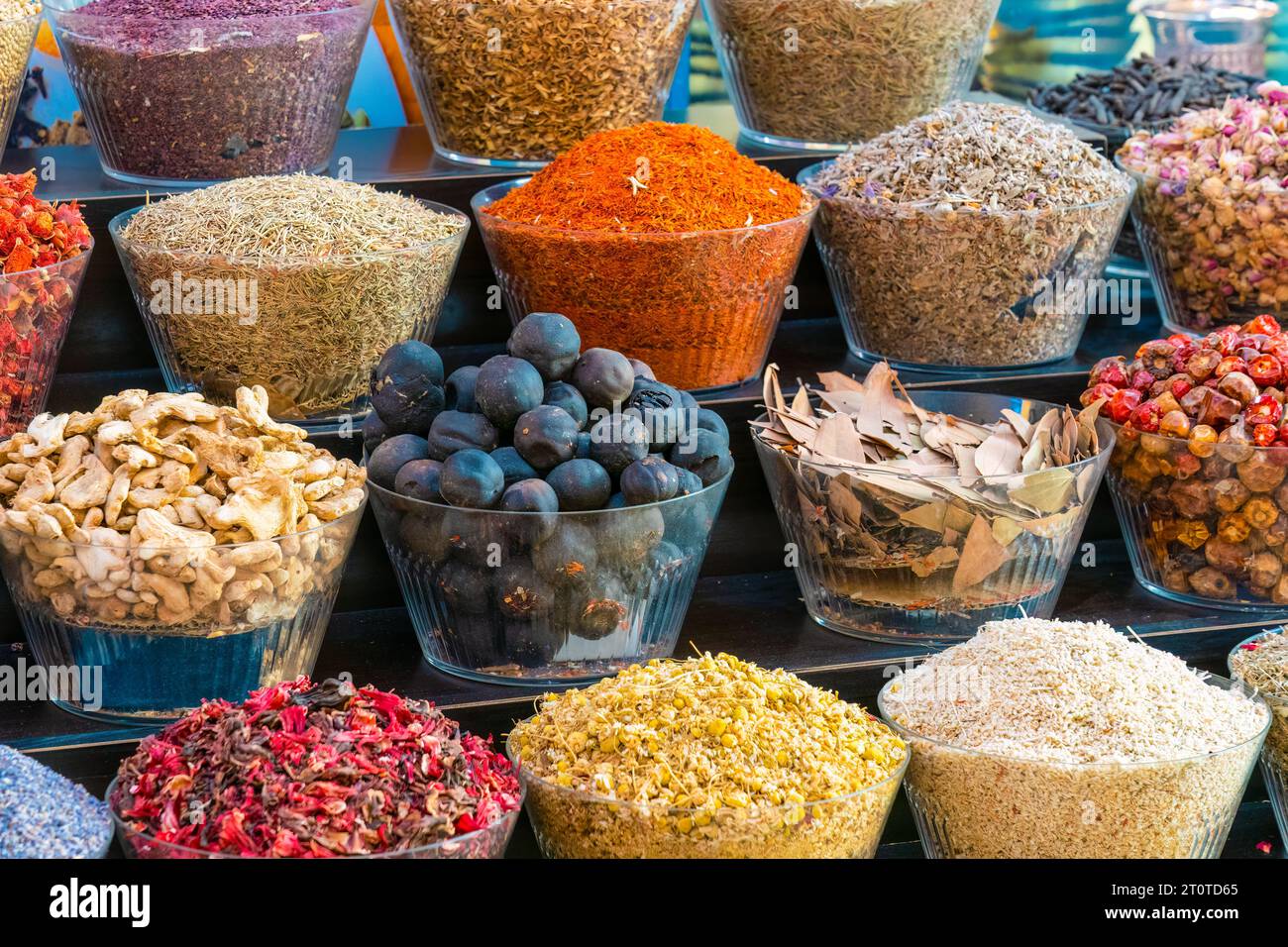 A bustling marketplace filled with vibrant colors of aromatic spices ...