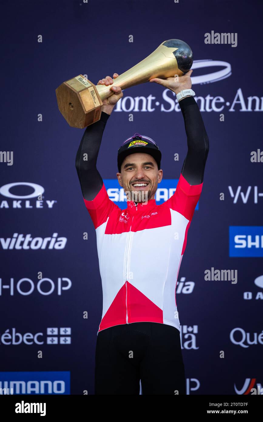Swiss rider Nino Schuter celebrates his overall triumph in the Mountain ...