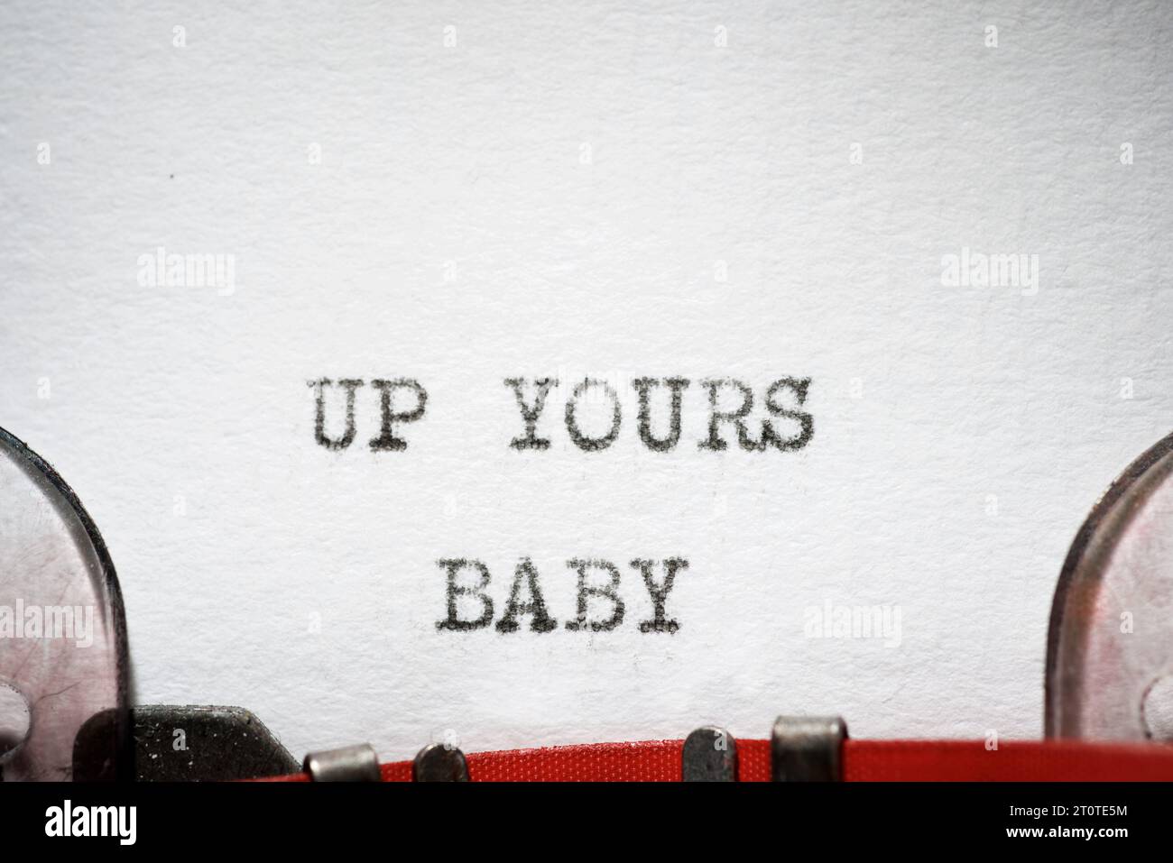 Up yours baby text written with a typewriter Stock Photo - Alamy