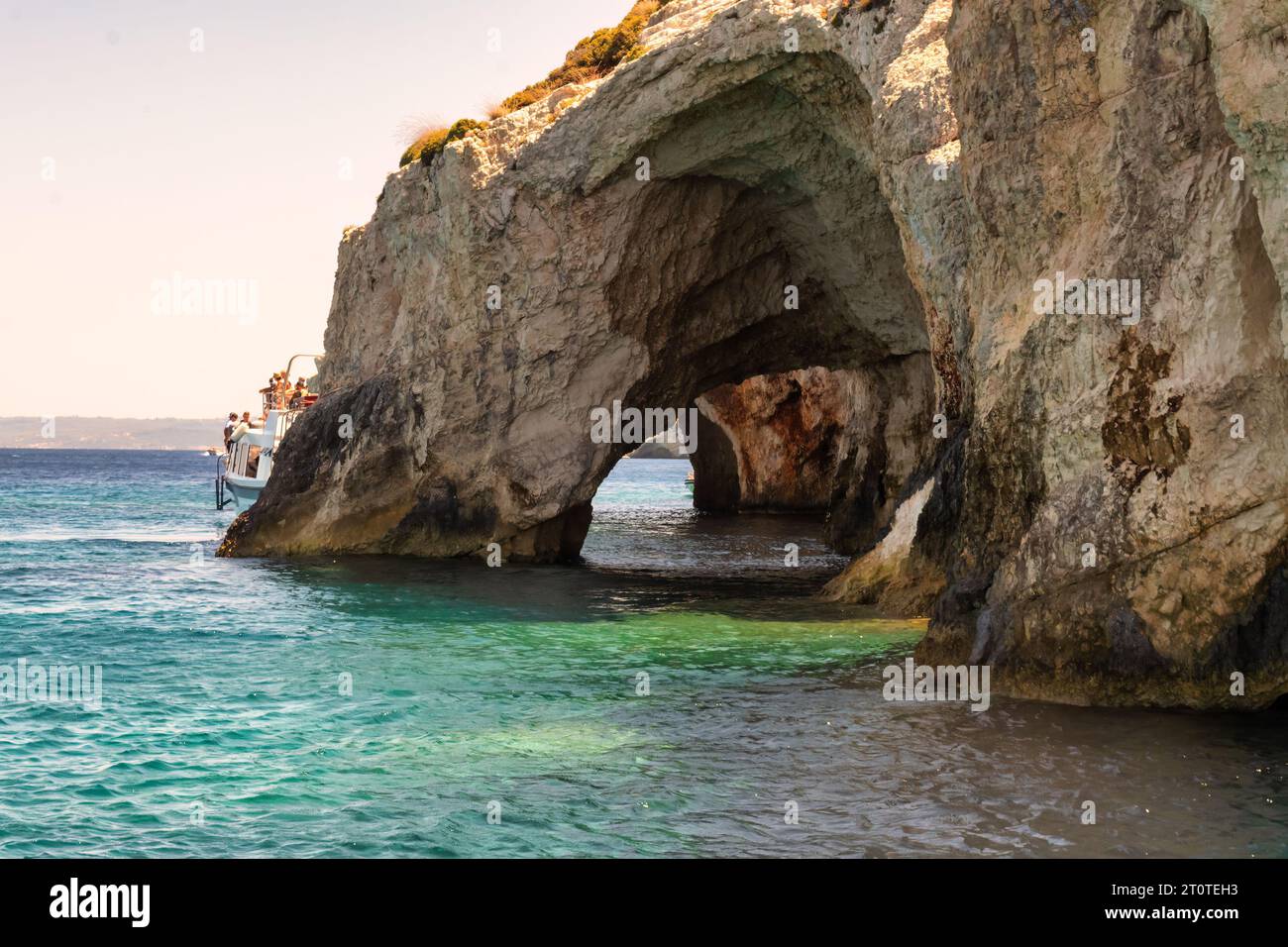 Boat going through caves hi-res stock photography and images - Alamy