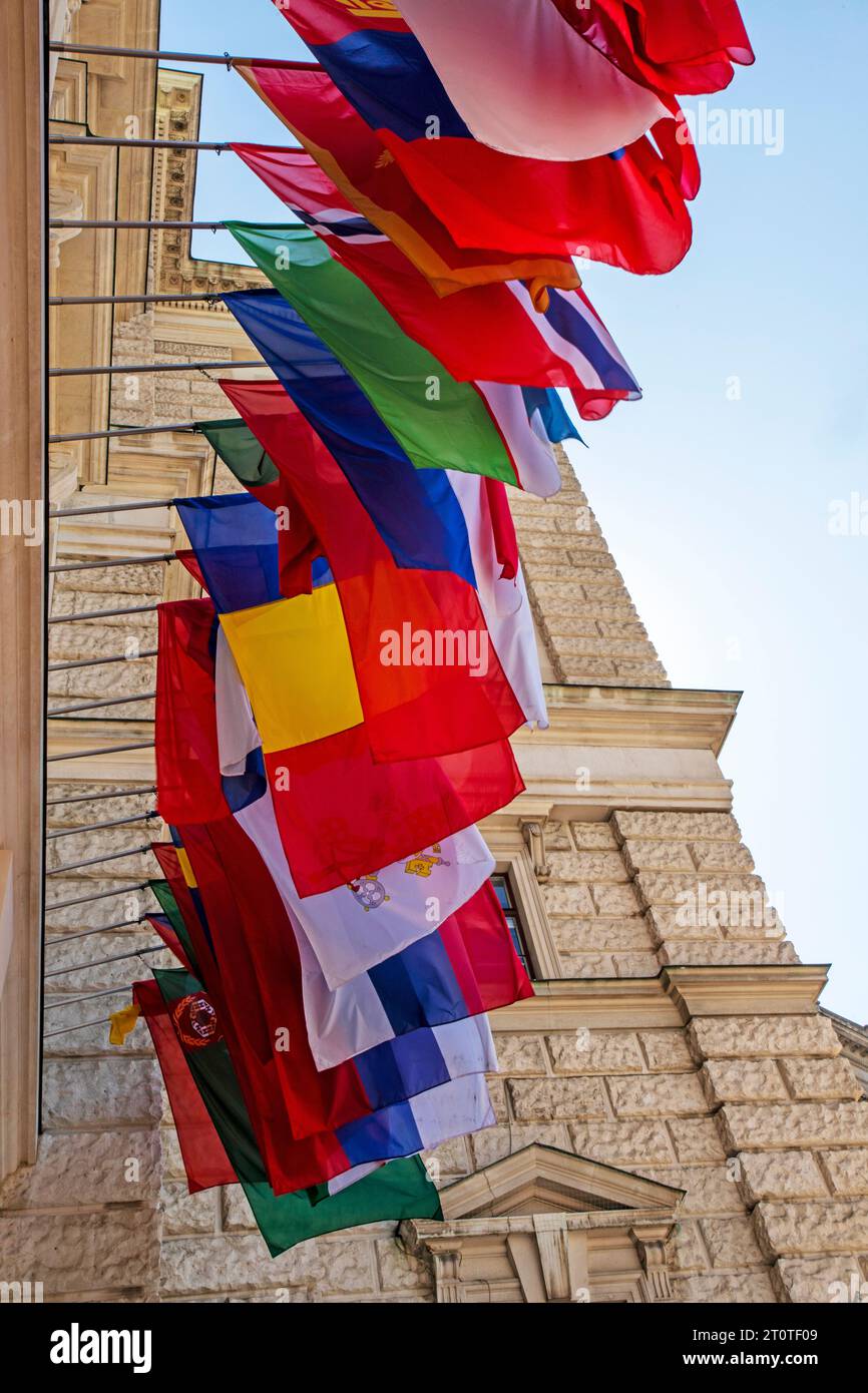 flags of different countries of Europe, America, Canada on a blue ...
