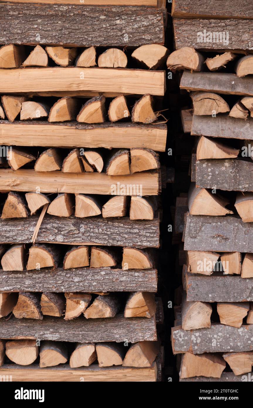 A pile of freshly cut firewood stacked up in a neat pile Stock Photo ...
