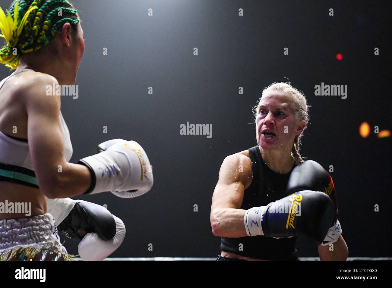 Sana Hazuki of Japan defeats Denise Castle in their fight for the WBC ...
