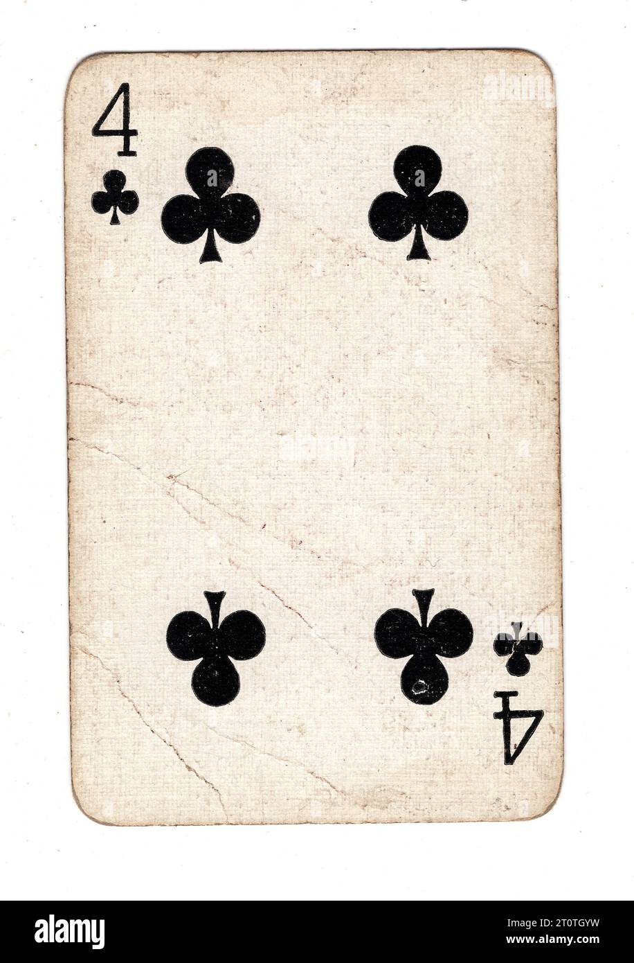 A vintage four of clubs playing card isolated on a white background ...