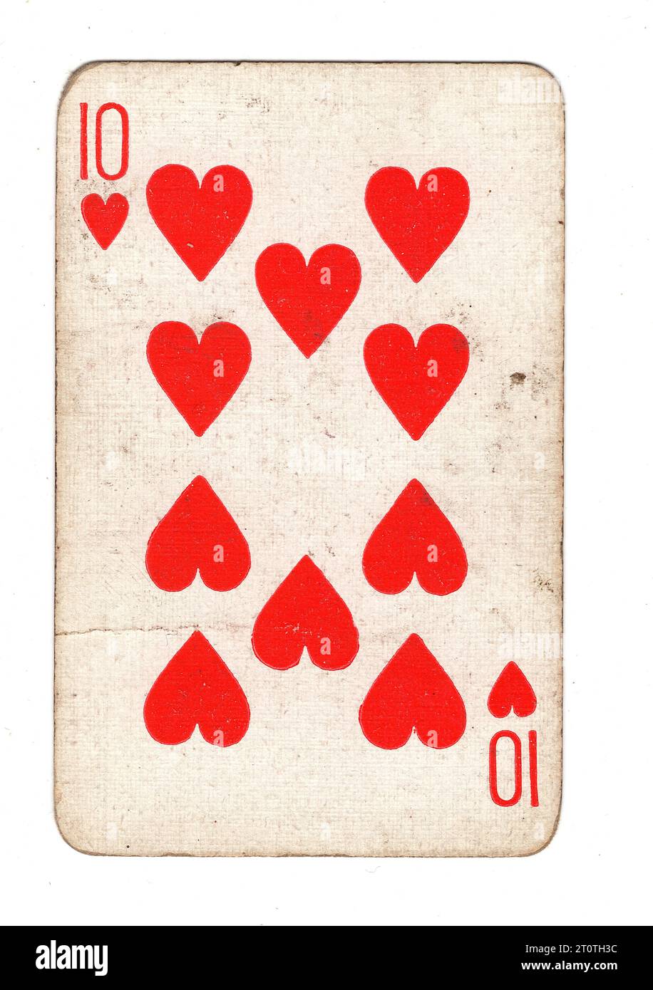 A vintage ten of hearts playing card isolated on a white background ...