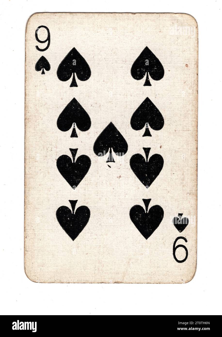 A vintage nine of spades playing card isolated on a white background ...