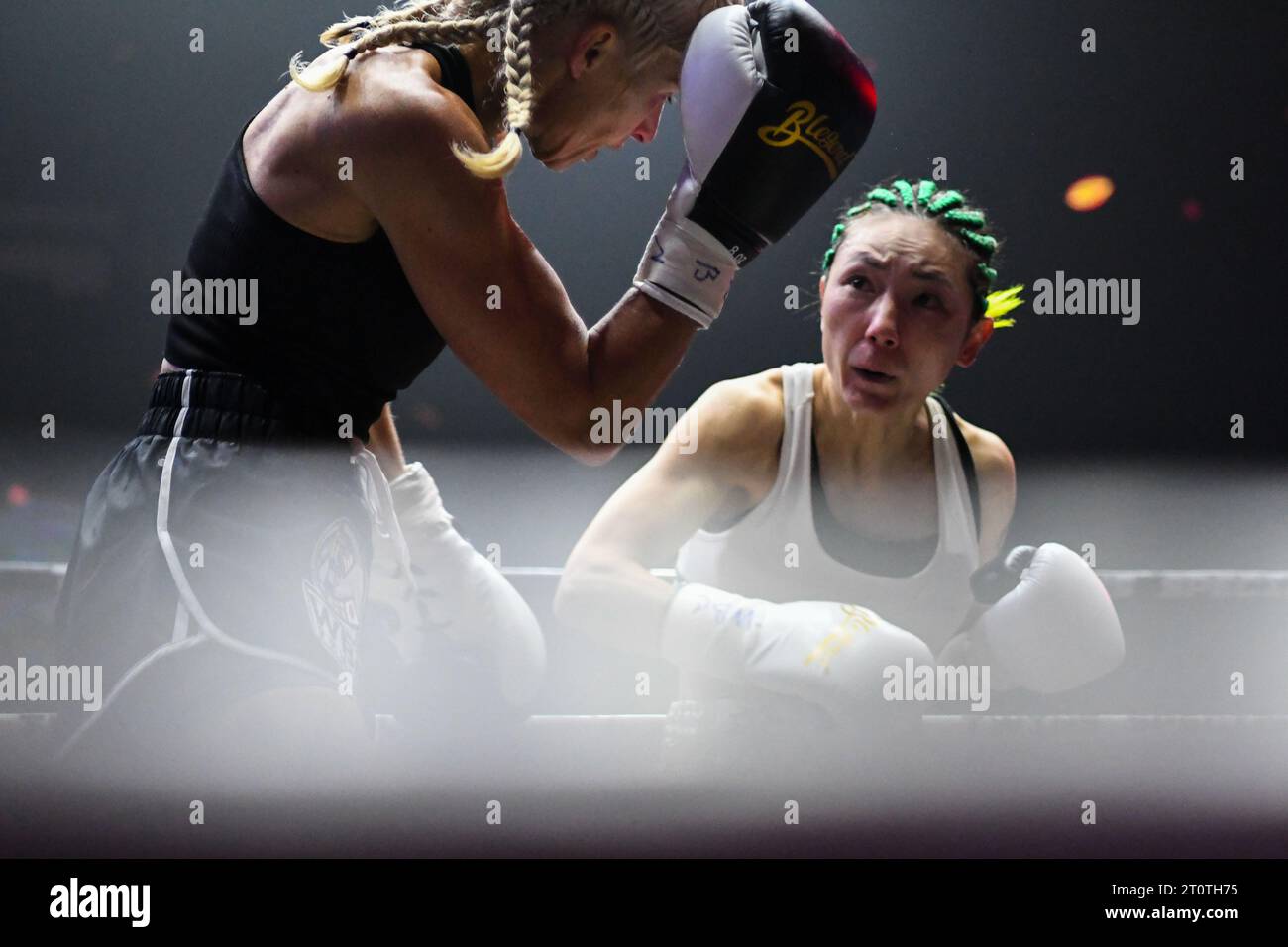 Sana Hazuki of Japan defeats Denise Castle in their fight for the WBC ...