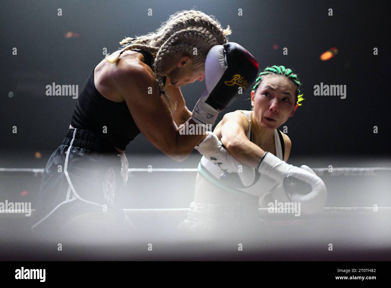 Sana Hazuki of Japan defeats Denise Castle in their fight for the WBC ...