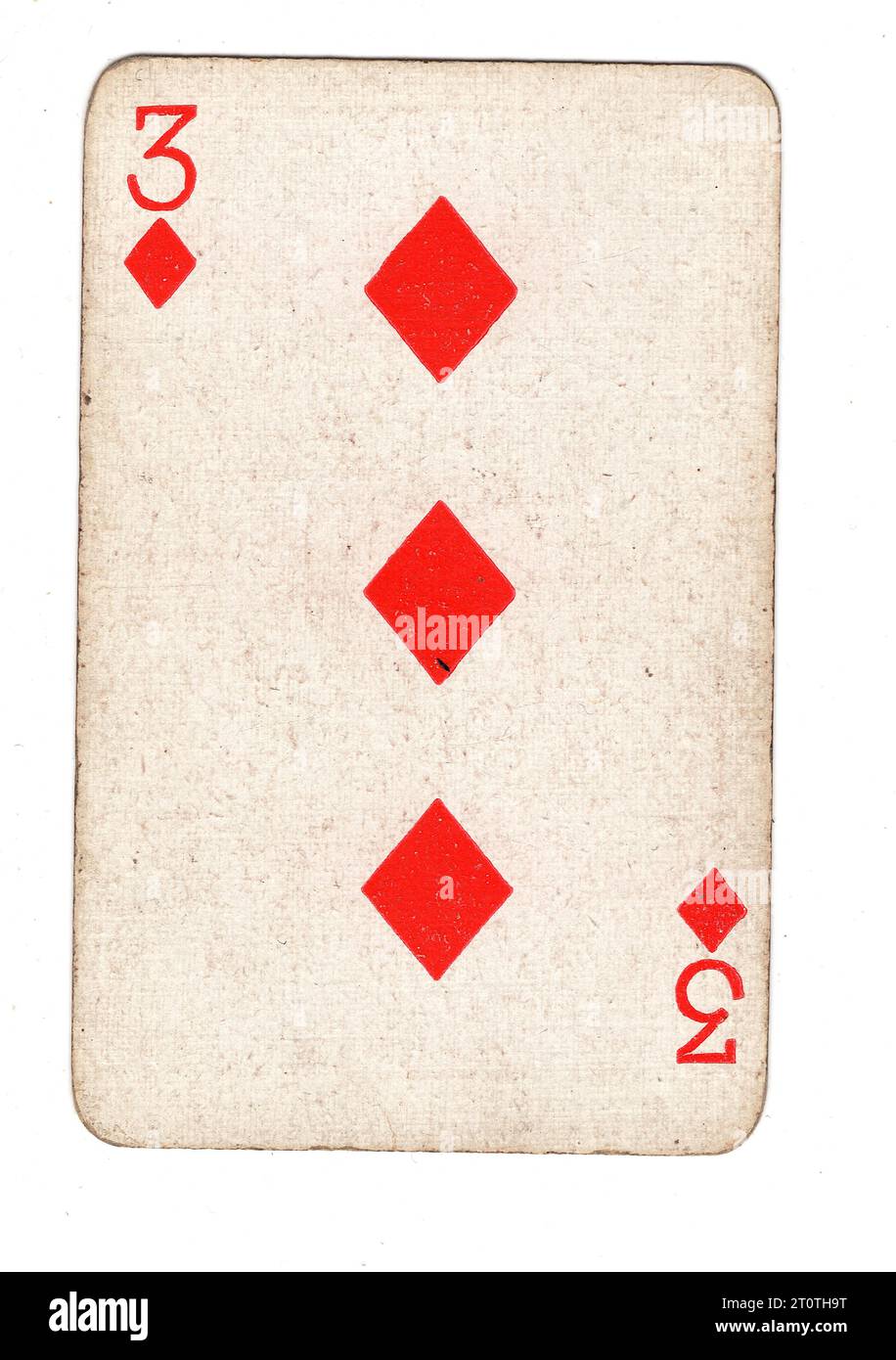 A vintage three of diamonds playing card isolated on a white background ...